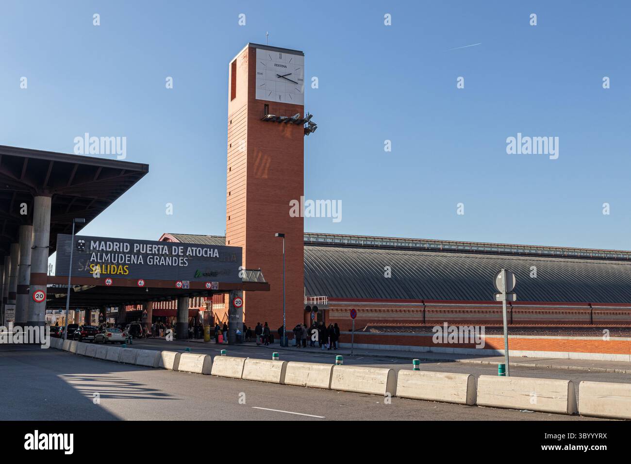 Madrid, Spain. Entrance of Atocha Station showing the clock tower and ...