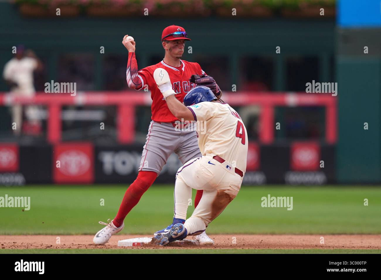 Los Angeles Angels shortstop Zach Neto, left, forces out Philadelphia ...