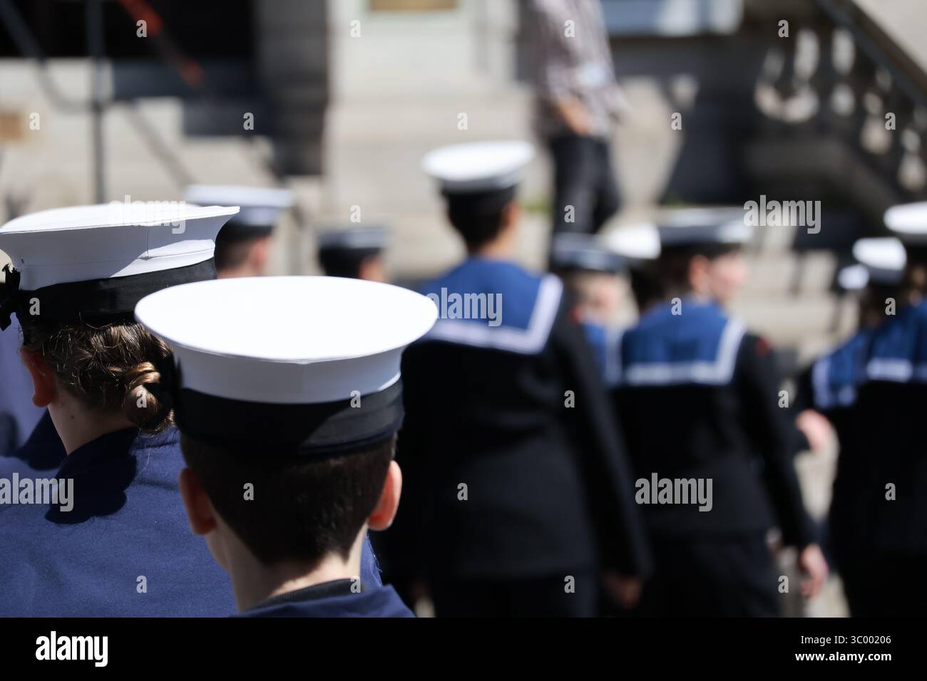 Navy sailors in uniform with their backs to camera Uniformed Heads and ...