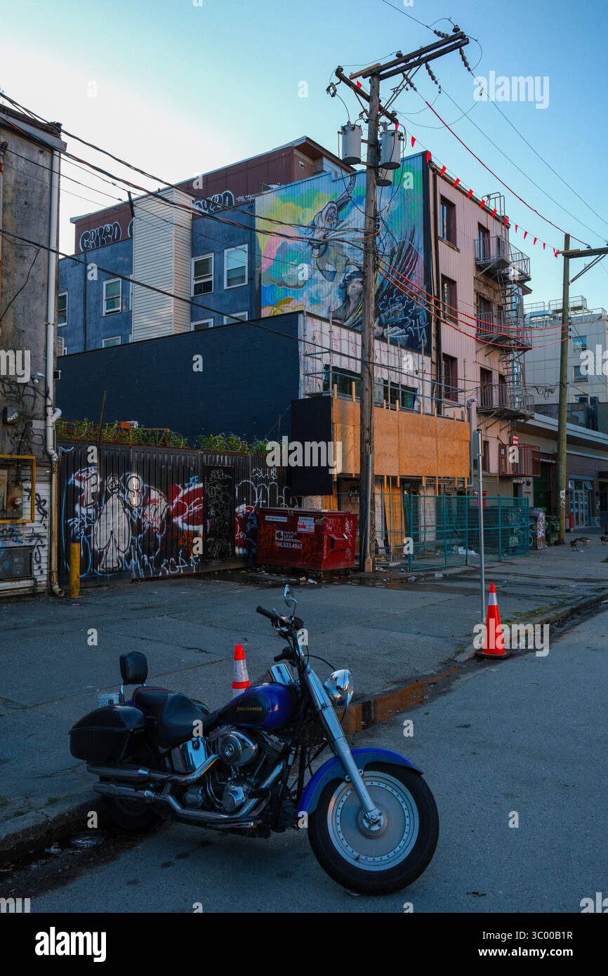 A Harley Davidson motorcycle along a backstreet in East Vancouver with ...