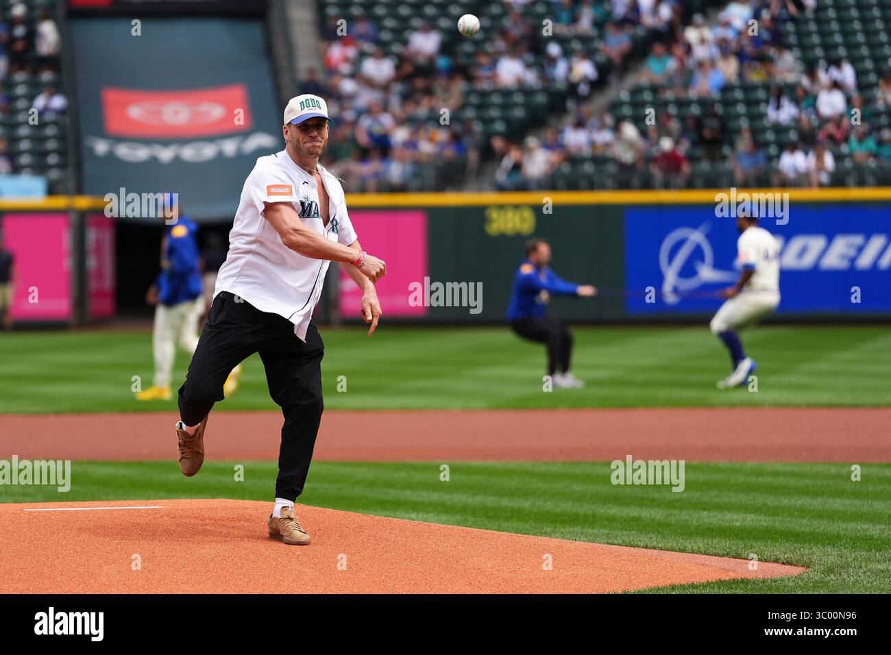 Seattle Seahawks wide receiver Cooper Kupp throws out the ceremonial ...