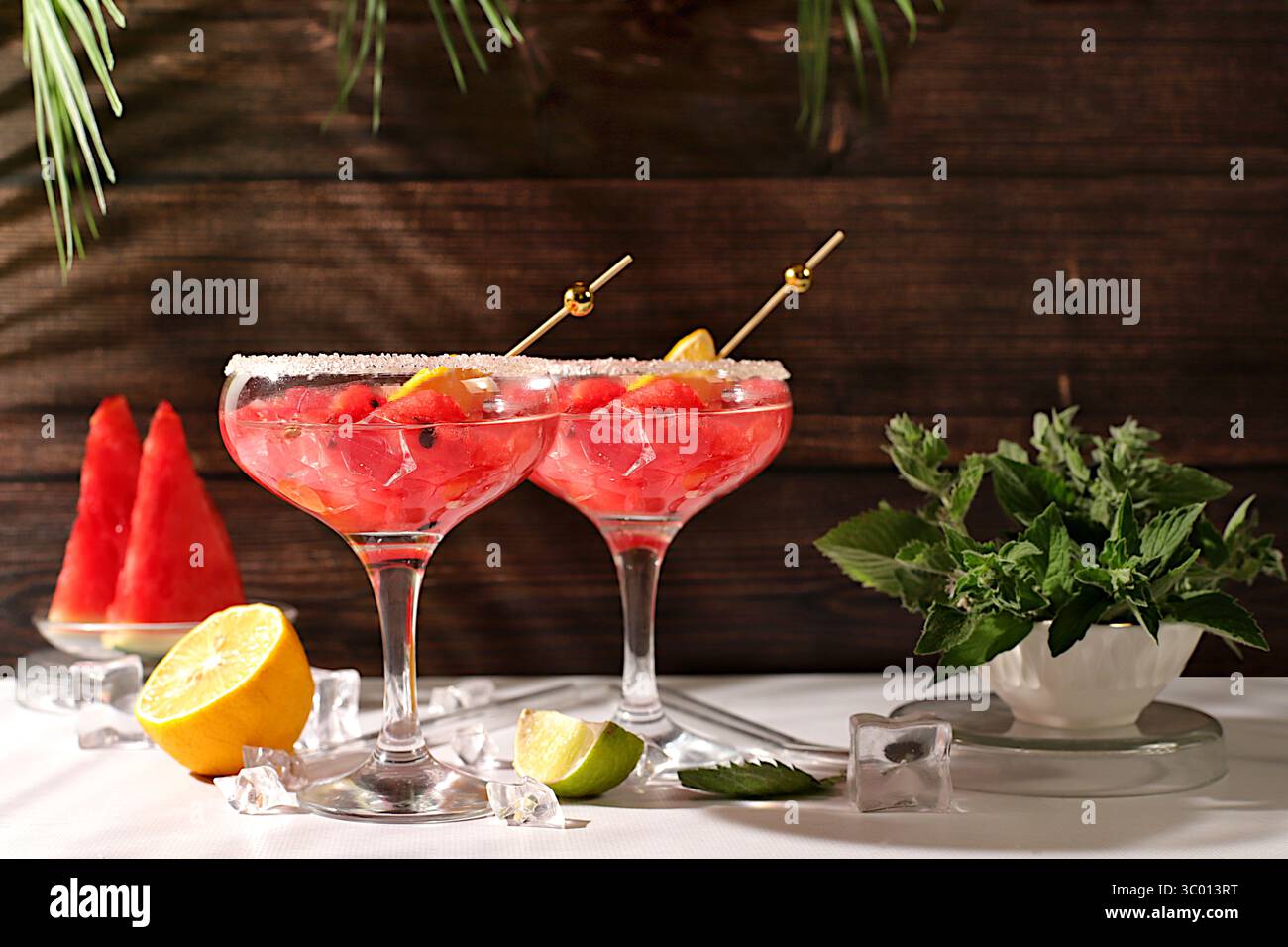 Ice punch with watermelon slices, lemon, mint, ice with tequila, vodka ...