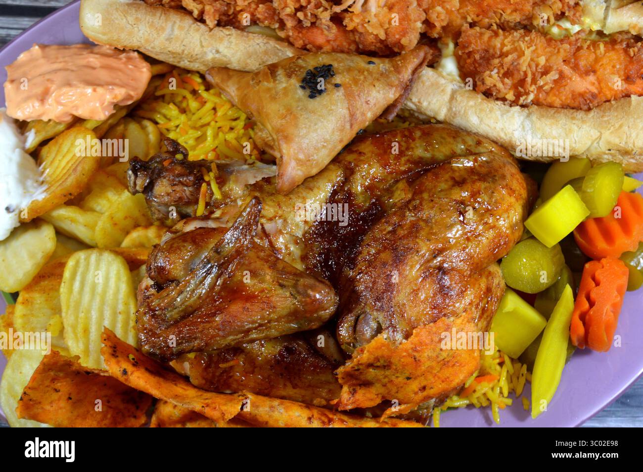 Arabic Syrian cuisine of machine grilled barbecued chicken with ...