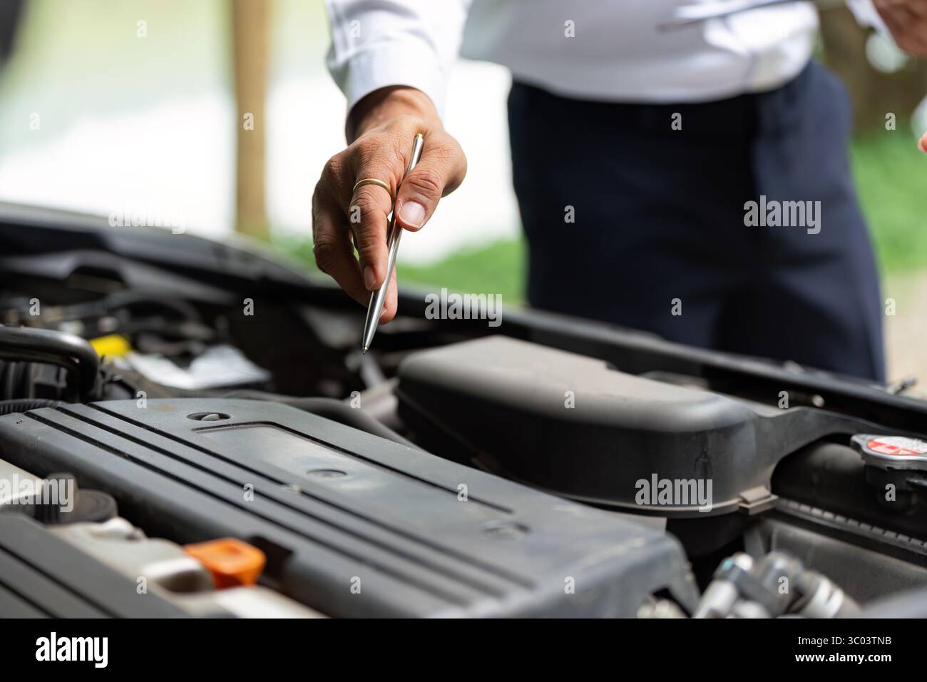 Insurance Inspection. Mechanic checking vehicle components for client ...