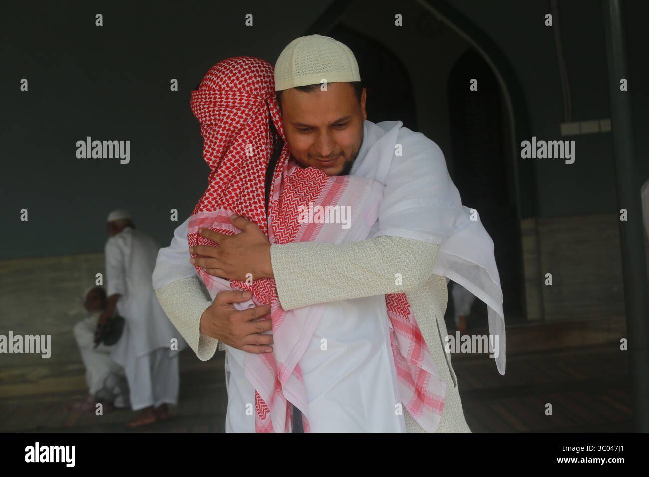 An editorial image showing two community members, dressed in ...