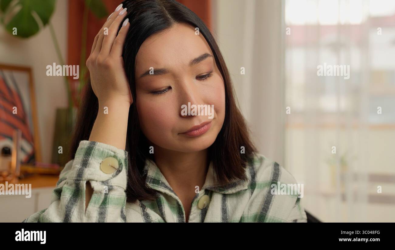Asian Korean Chinese Japanese woman holding head female suffering feel ...