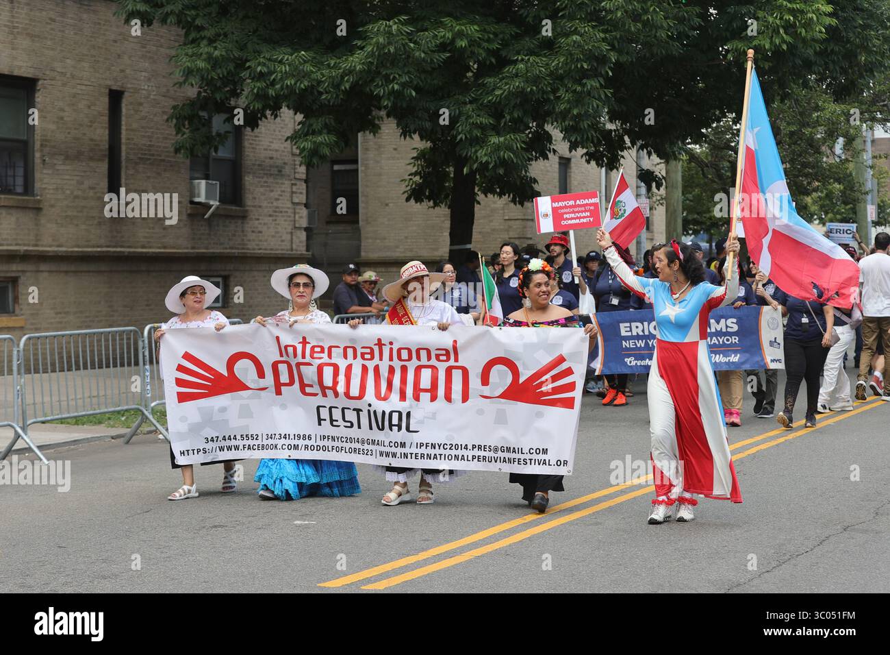 NEW YORK, NEW YORK JULY 20: Peruvian dancer performs alongside hundreds ...