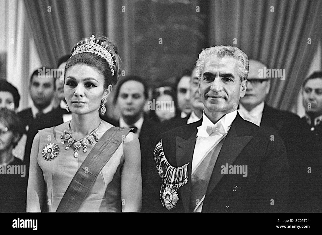 Iranian Empress Farah Diba and Shah of Persia Reza Pahlavi wear regal ...