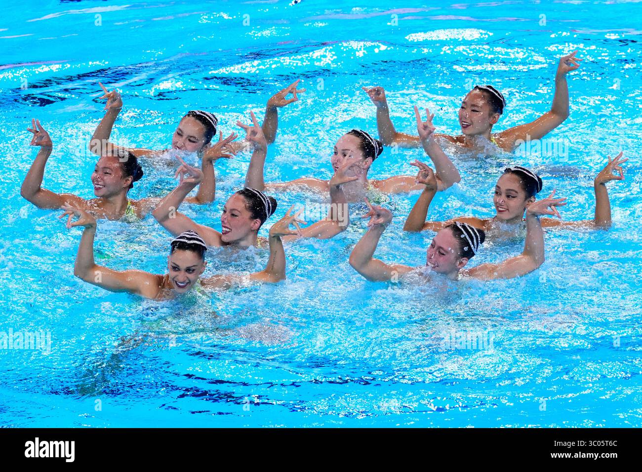 Team USA compete in the team technical preliminary of artistic swimming ...