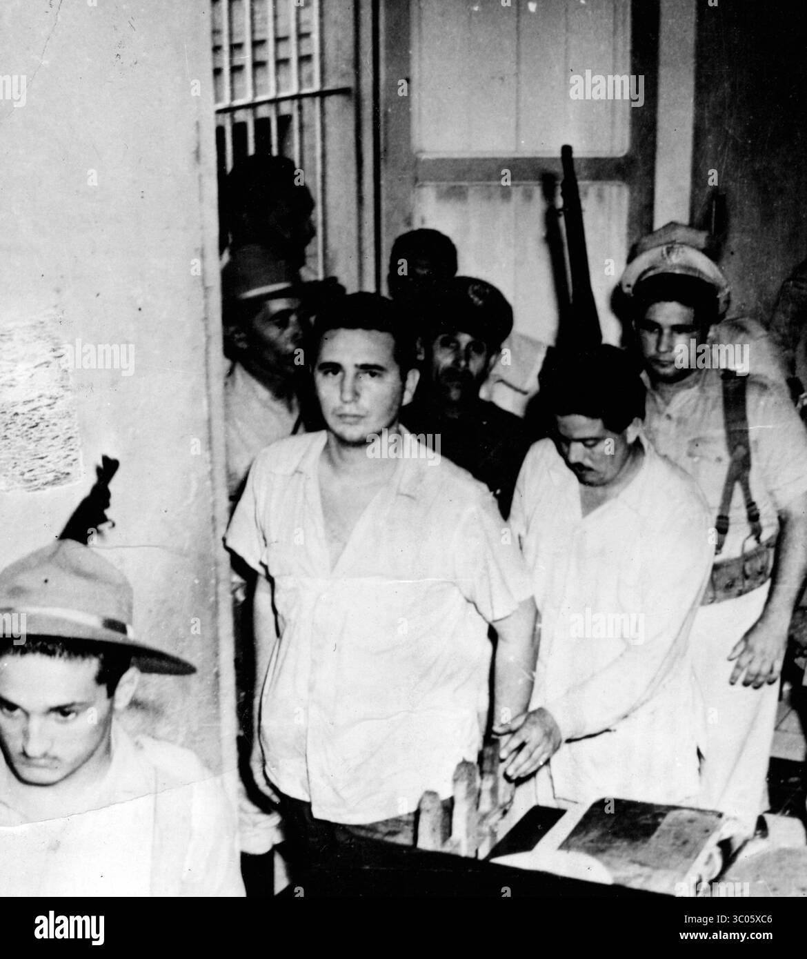 May 15, 1955 - Havana, Cuba - FIDEL CASTRO is led by prison guards as ...