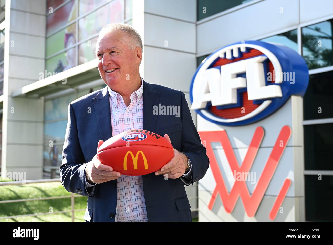 AFL EGM Football Performance Greg Swann poses for photo following a ...