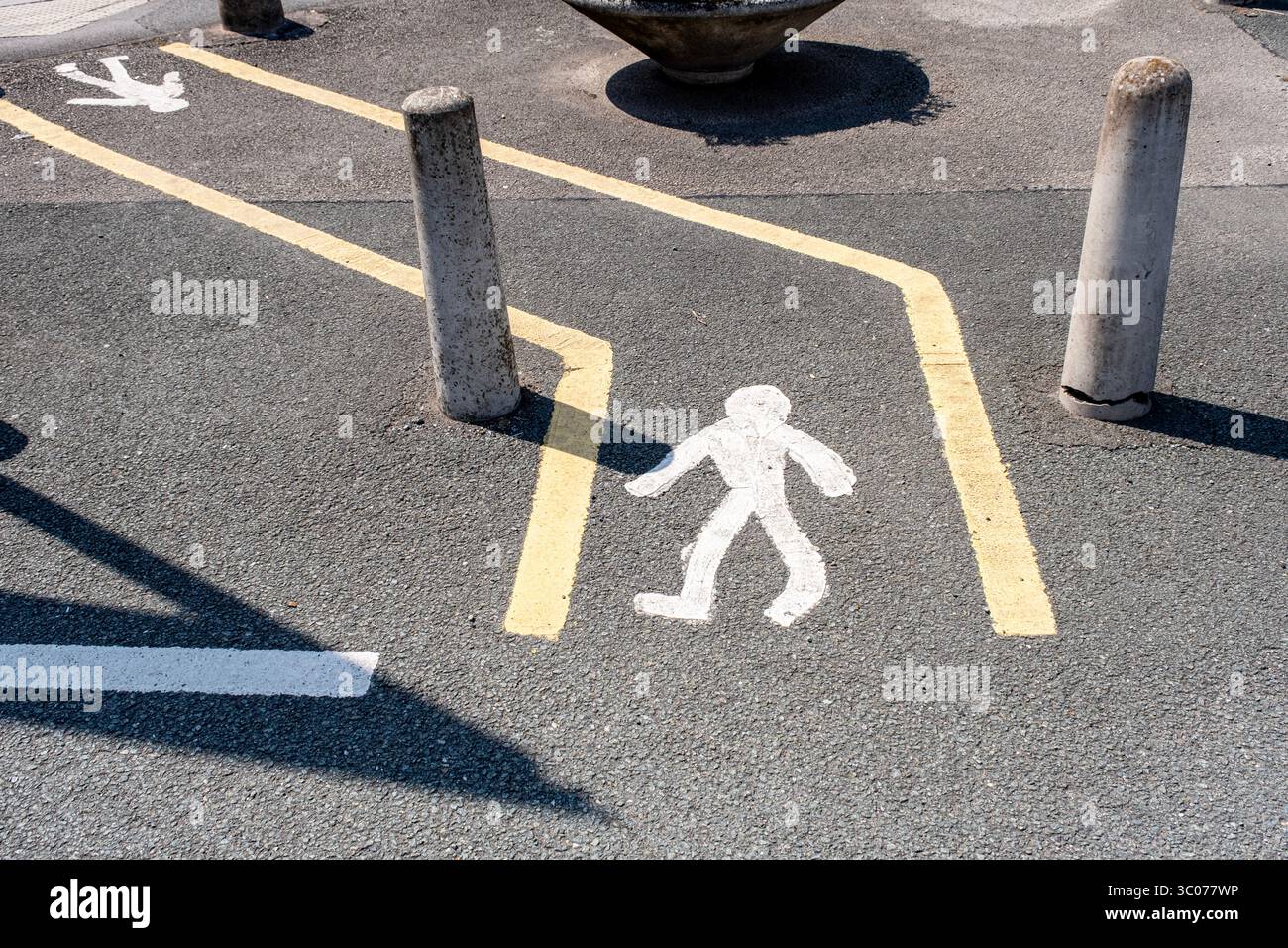 Footpath symbols painted on pavement Stock Photo - Alamy