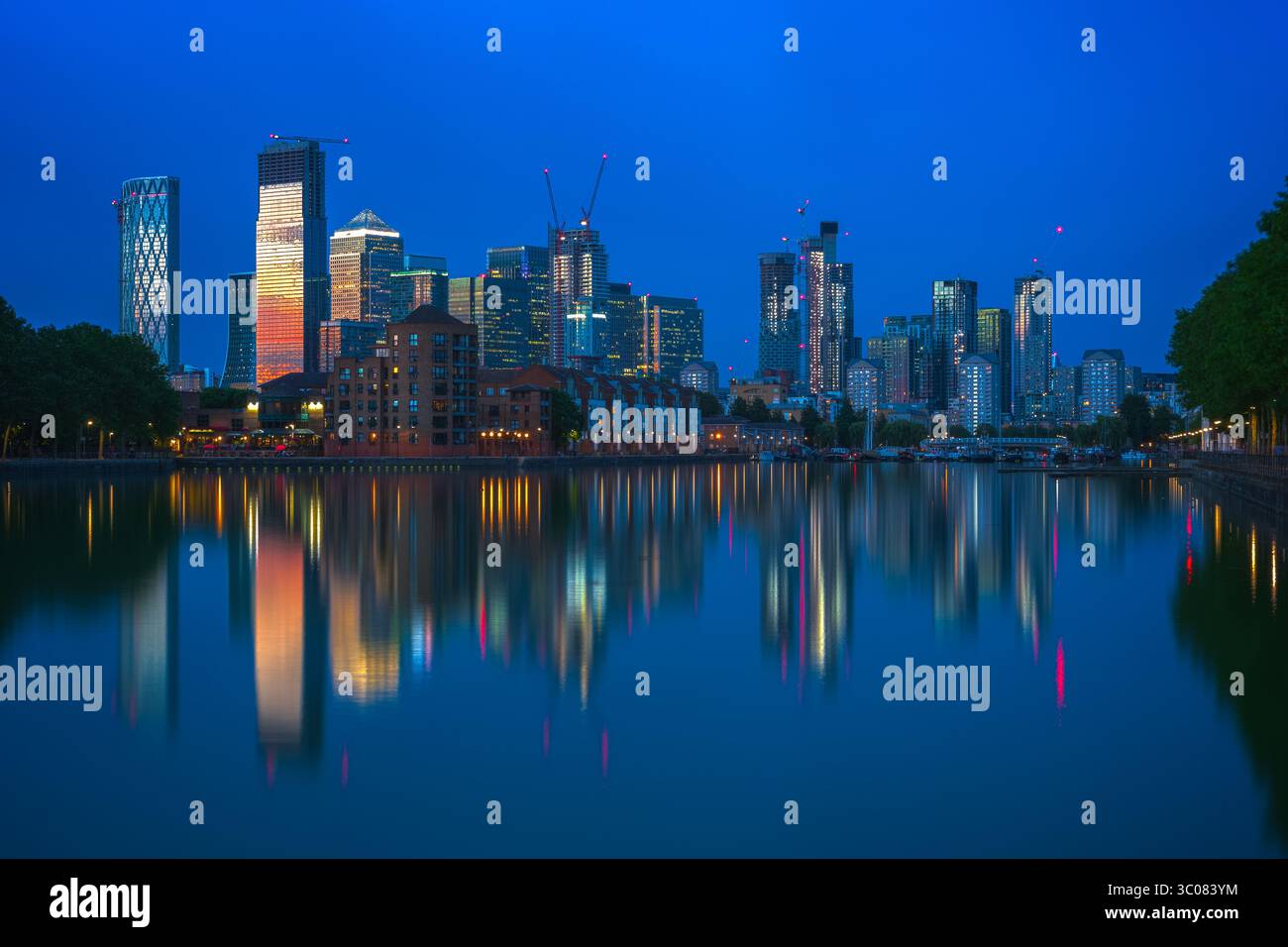 Long exposure, London cityscape Canary Wharf with reflection from ...