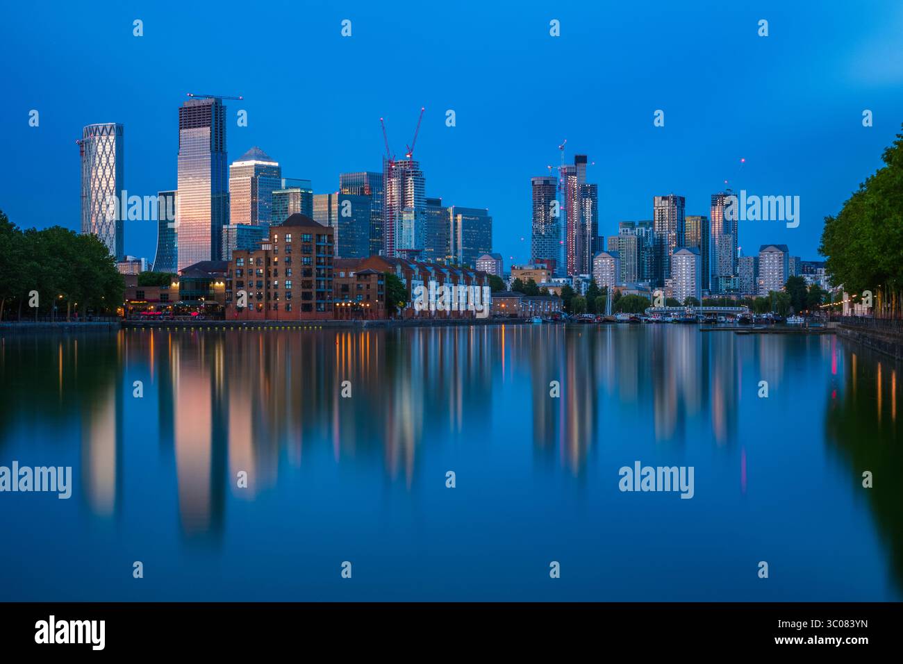 Long exposure, London cityscape Canary Wharf with reflection from ...