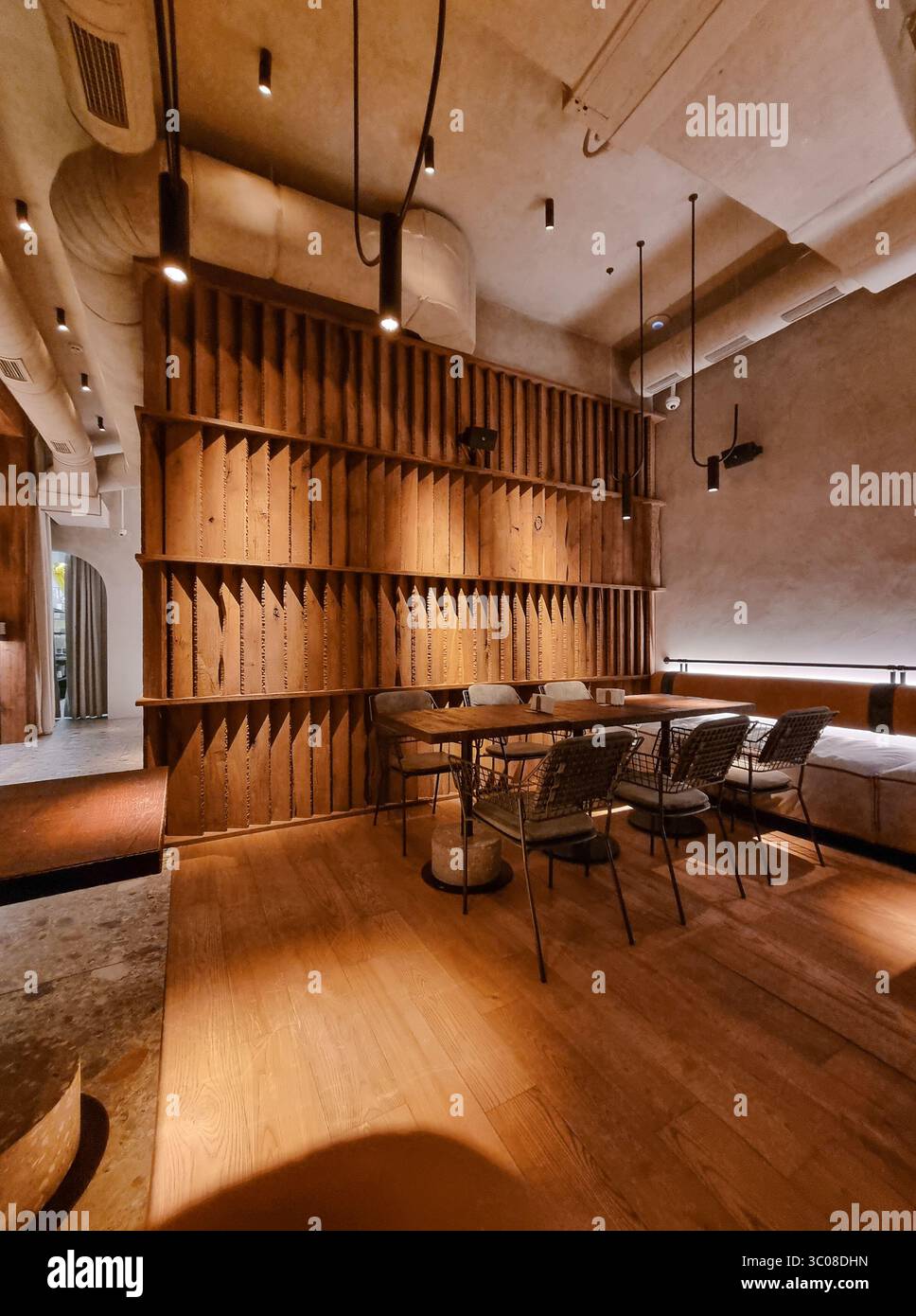 Empty stylish restaurant interior: warm tones and ambient lighting ...