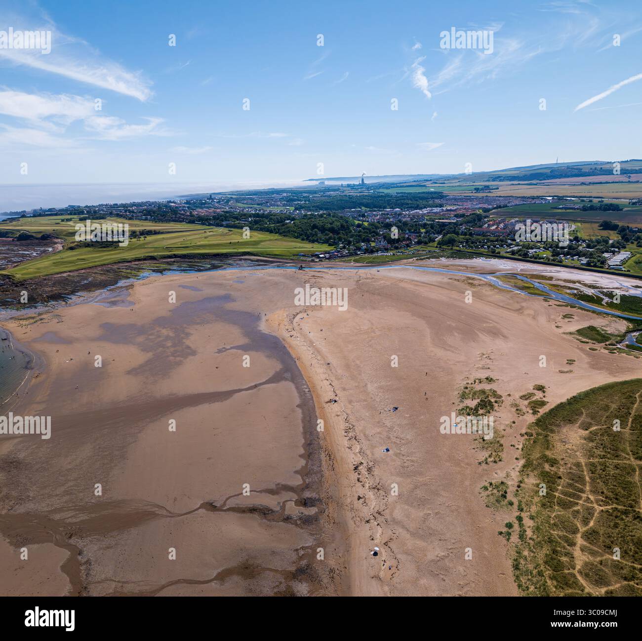 Aerial view of Dunbar's coastline reveals a tapestry of textures where ...