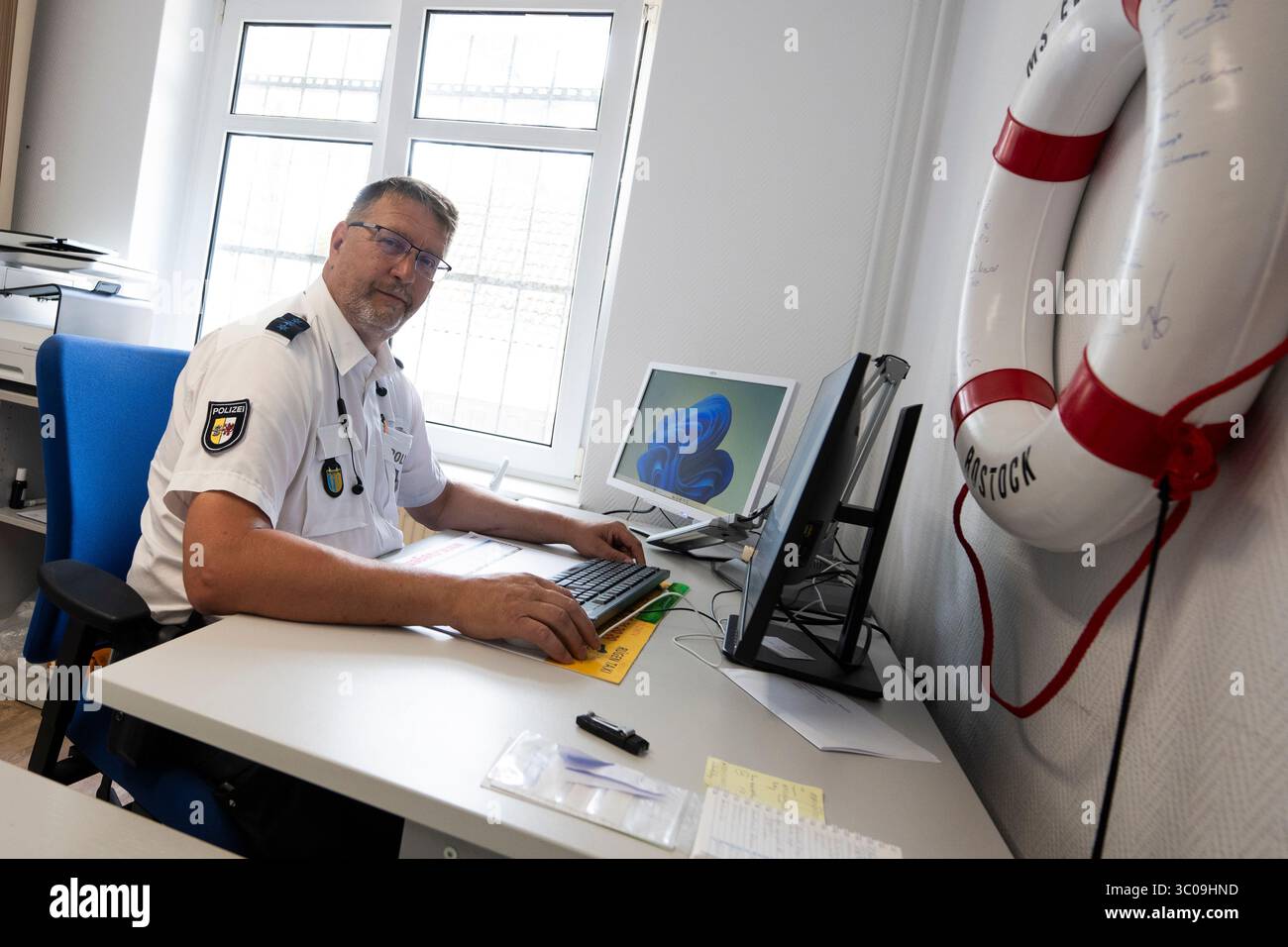 Hiddensee, Germany. 10th July, 2025. Chief Constable Thomas Moritz sits ...