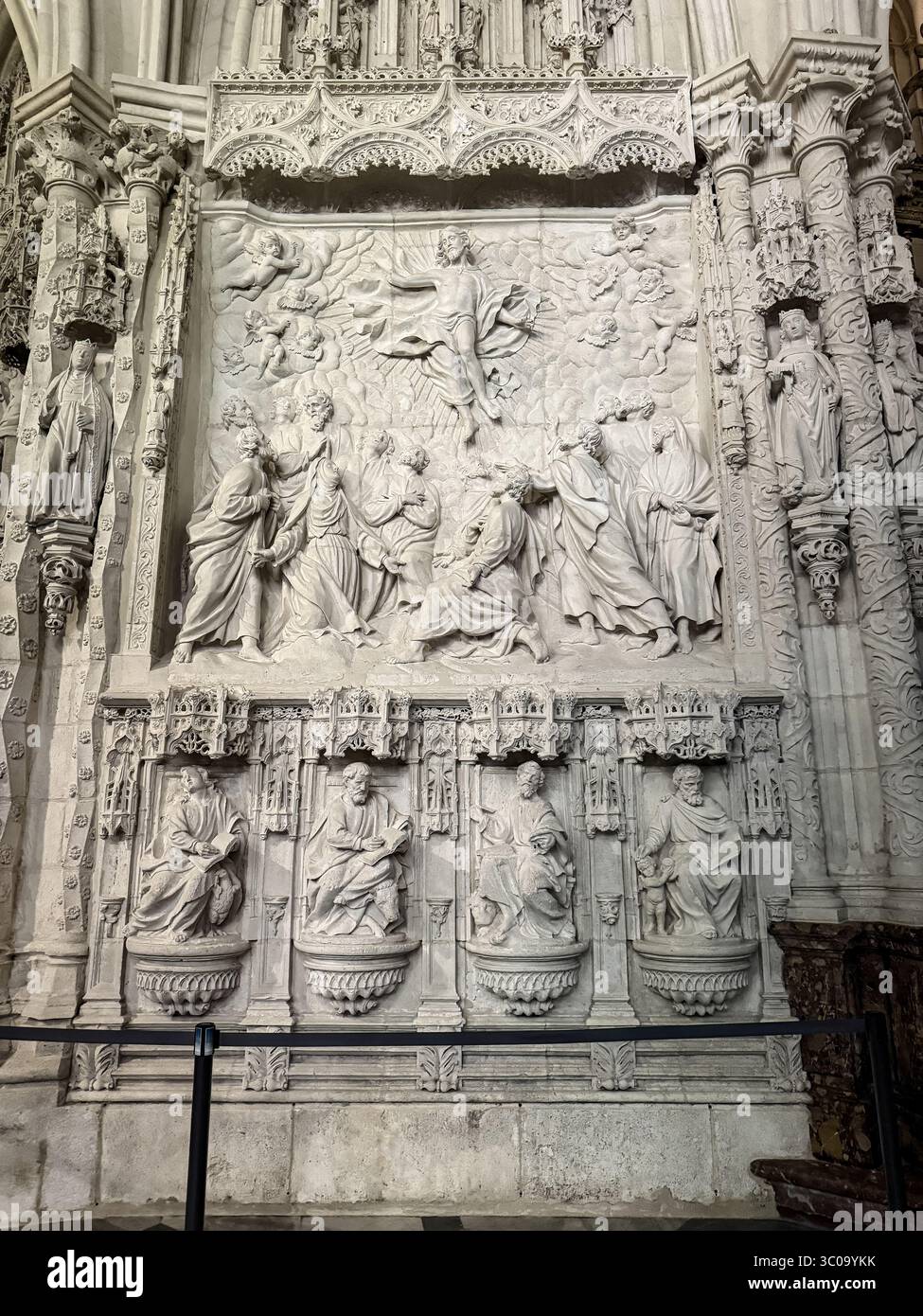 Elaborate relief with saints and the Virgin Mary in a gothic ...