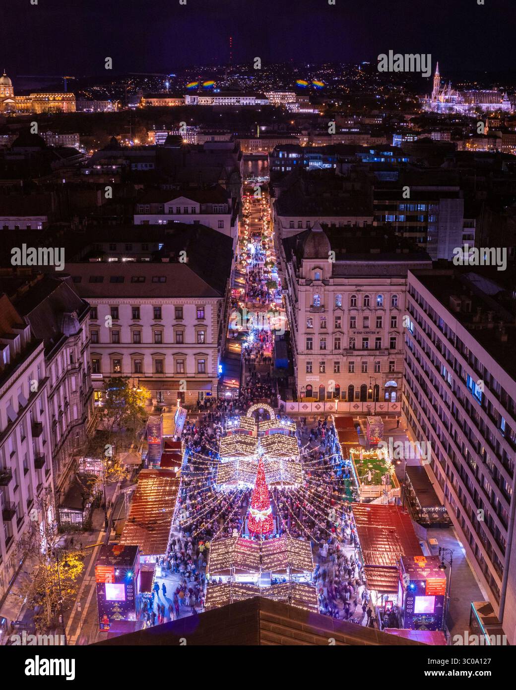Vibrant Holiday Lights and Crowds Celebrating in a Lively Urban Stock ...