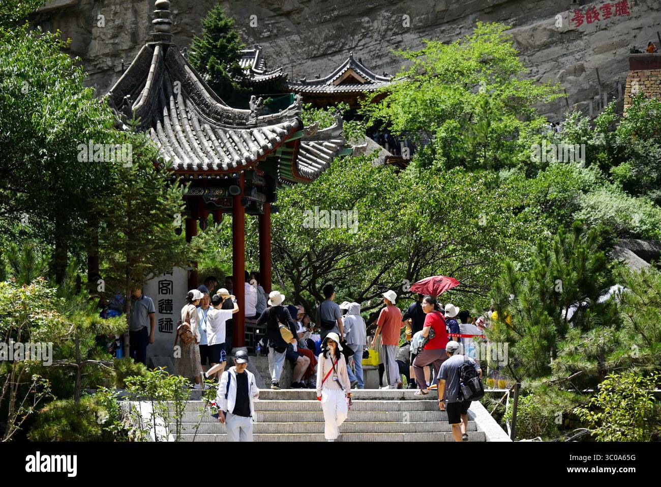 People visit the Xuankong Temple in Datong City, north China's Shanxi ...