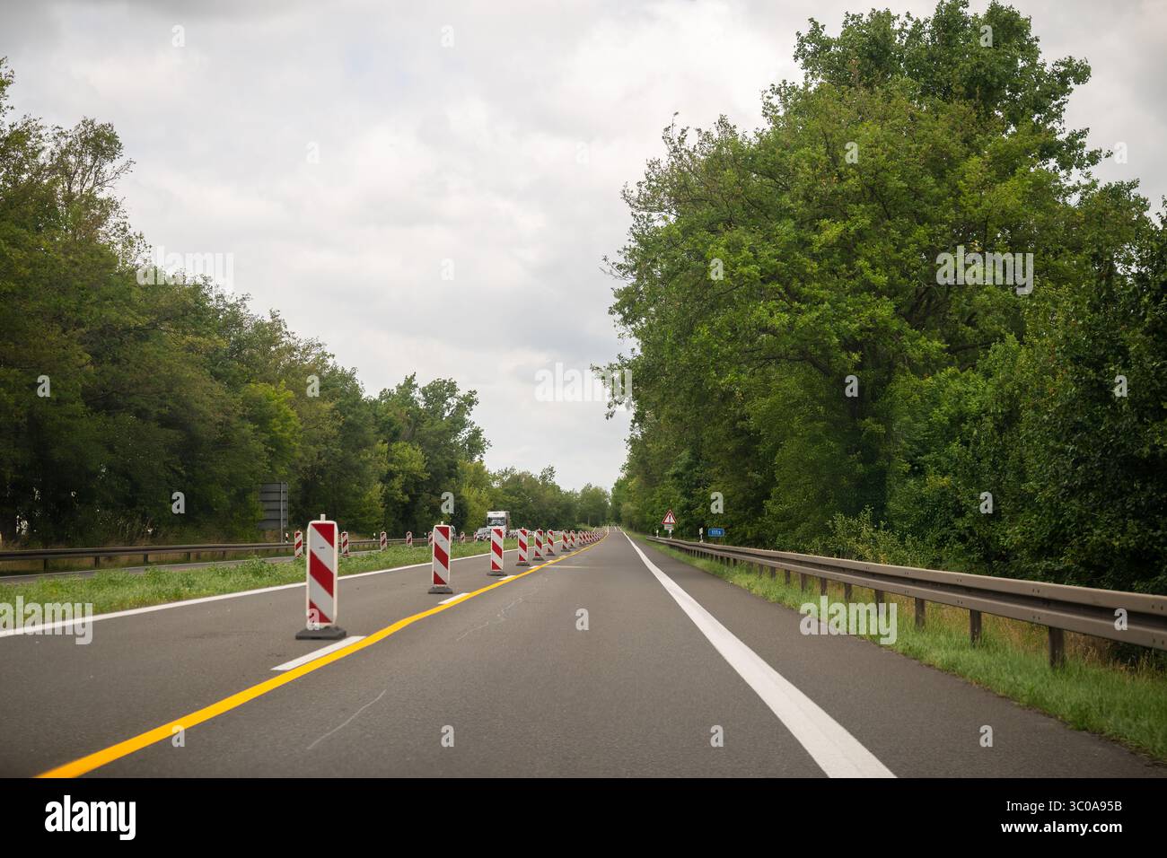 Traffic barriers and lane markings on rural highway during road ...