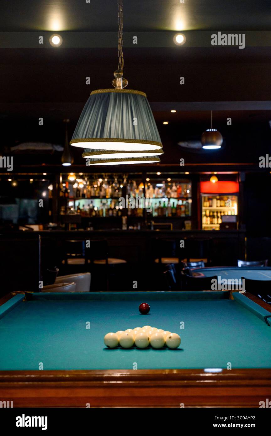 Billiard Table with balls and cue.billiard tables in the room without ...