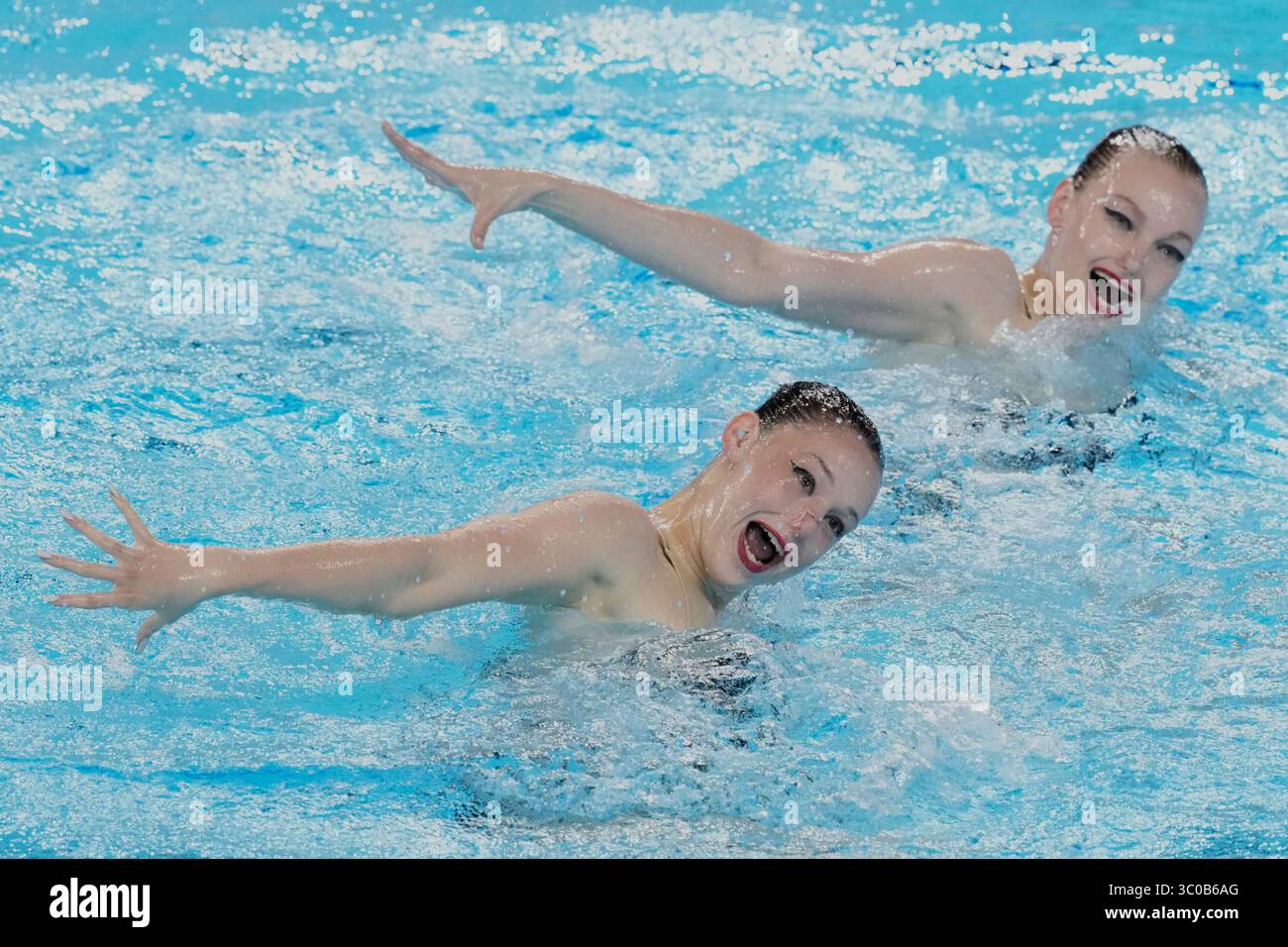 Daria Moshynska and Anastasiia Shmonina of Ukraine compete in the women ...