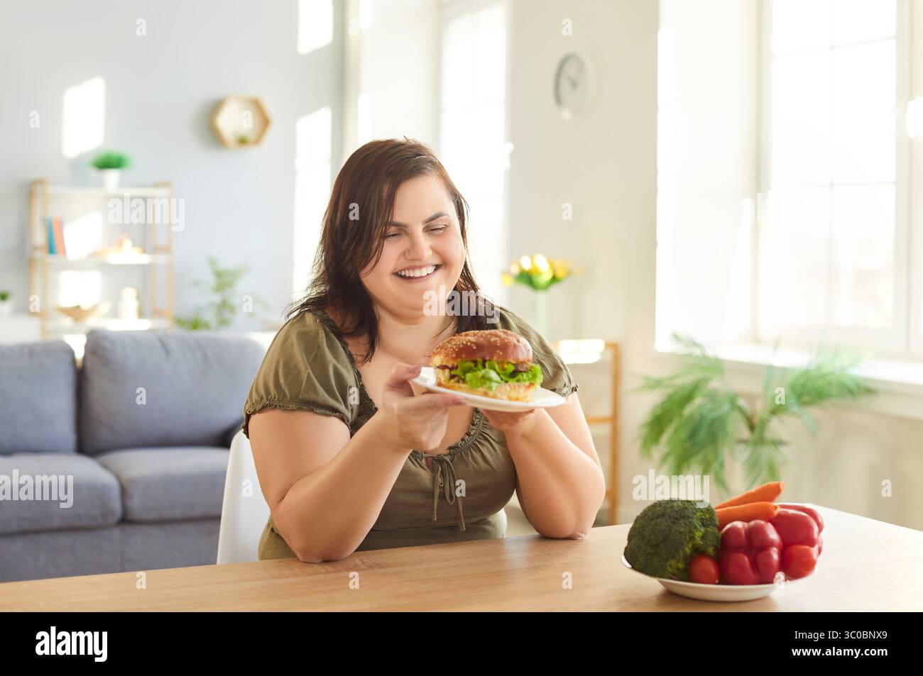 Hungry woman excessive food hi-res stock photography and images - Alamy
