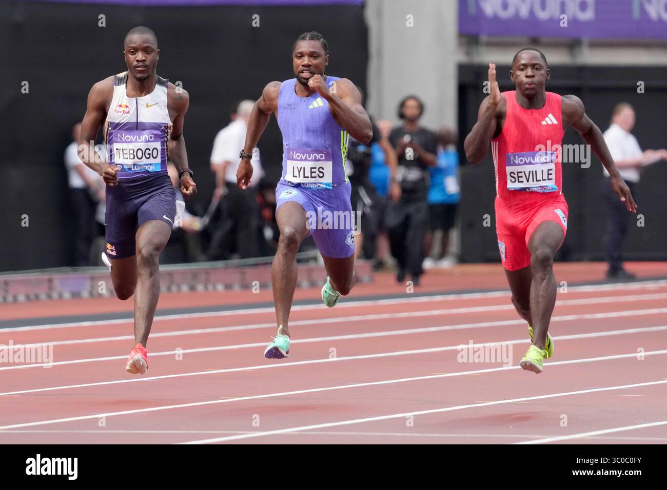 Oblique Seville (JAM), right, wins the 100m in 9.86 during the London Athletics Meet at London ...