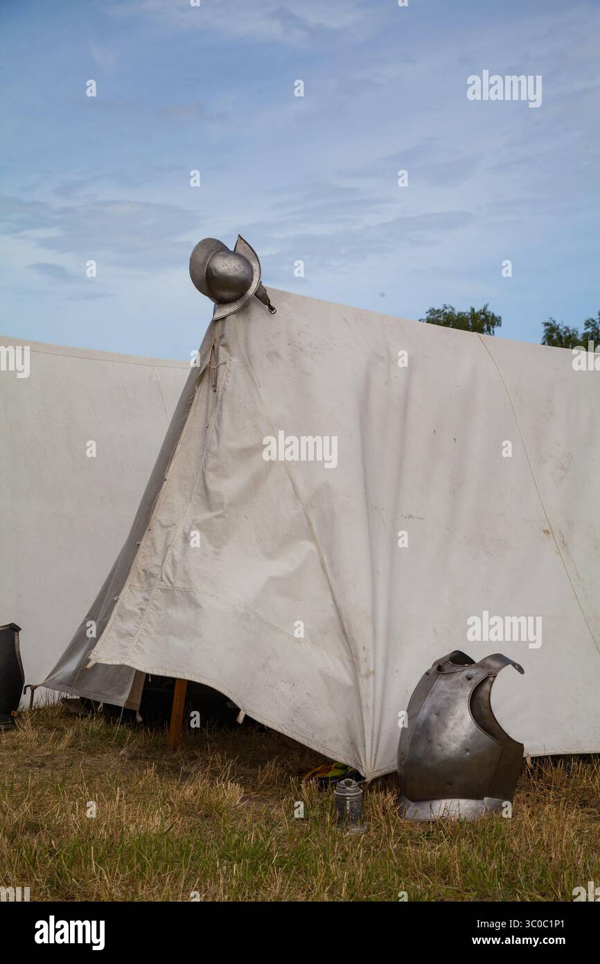 Museum exhibit of a medieval tent camp with historical props and period ...