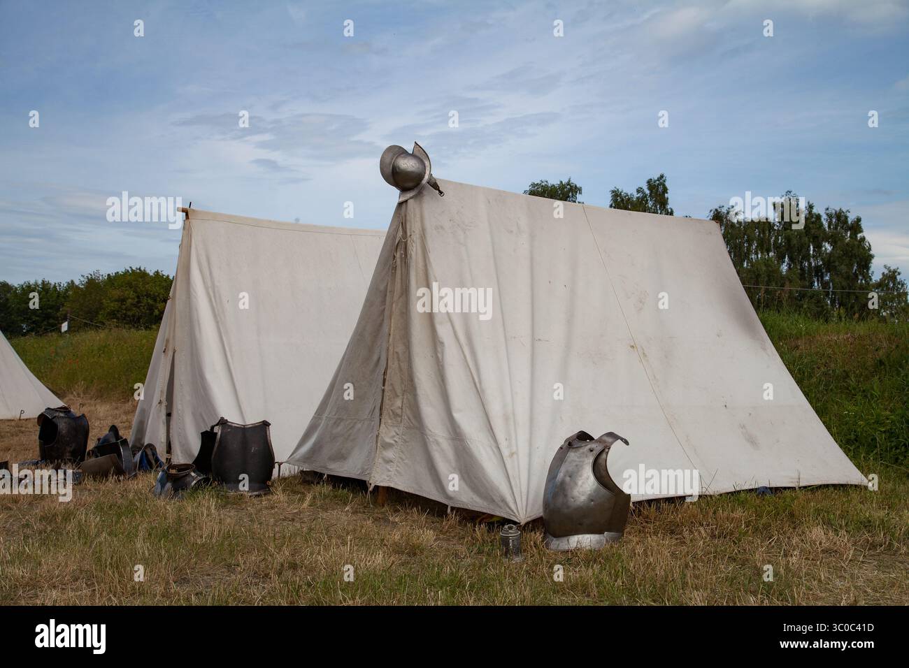 Museum exhibit of a medieval tent camp with historical props and period ...