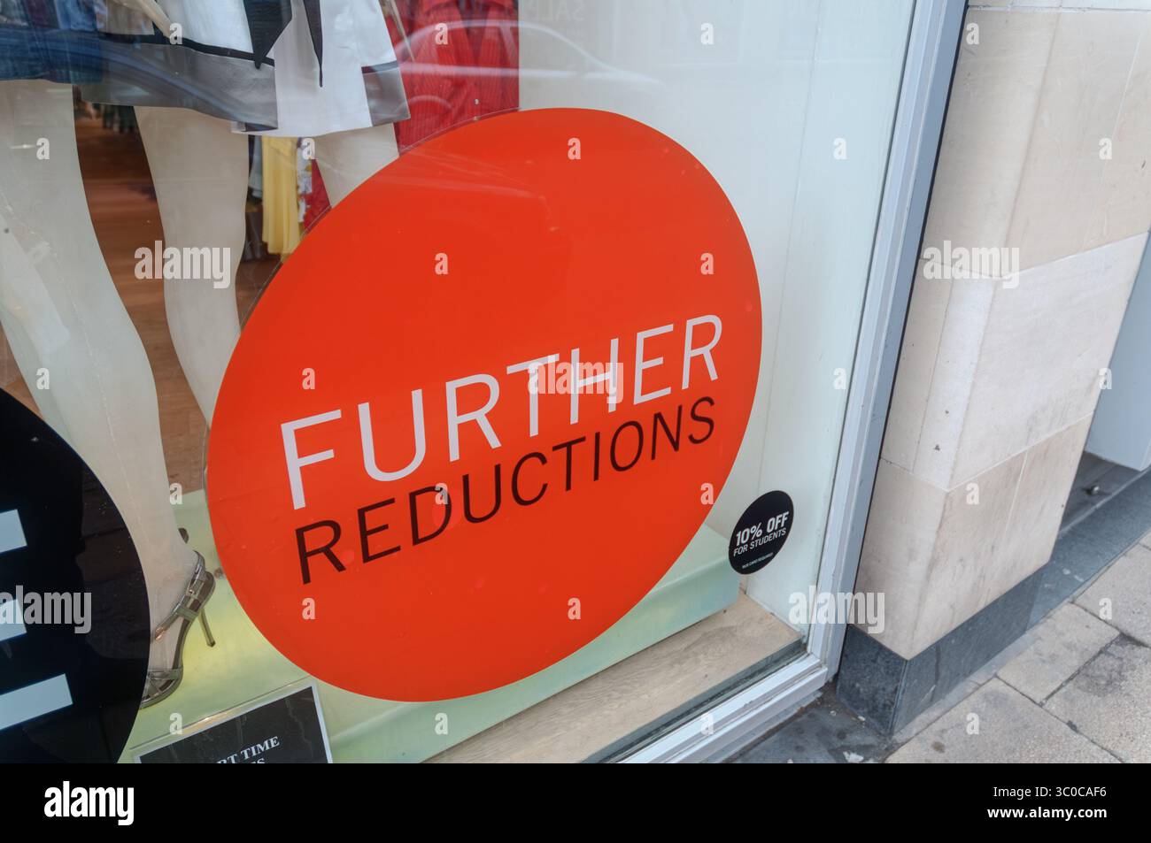Further reductions sign in a shop window in York England Stock Photo ...