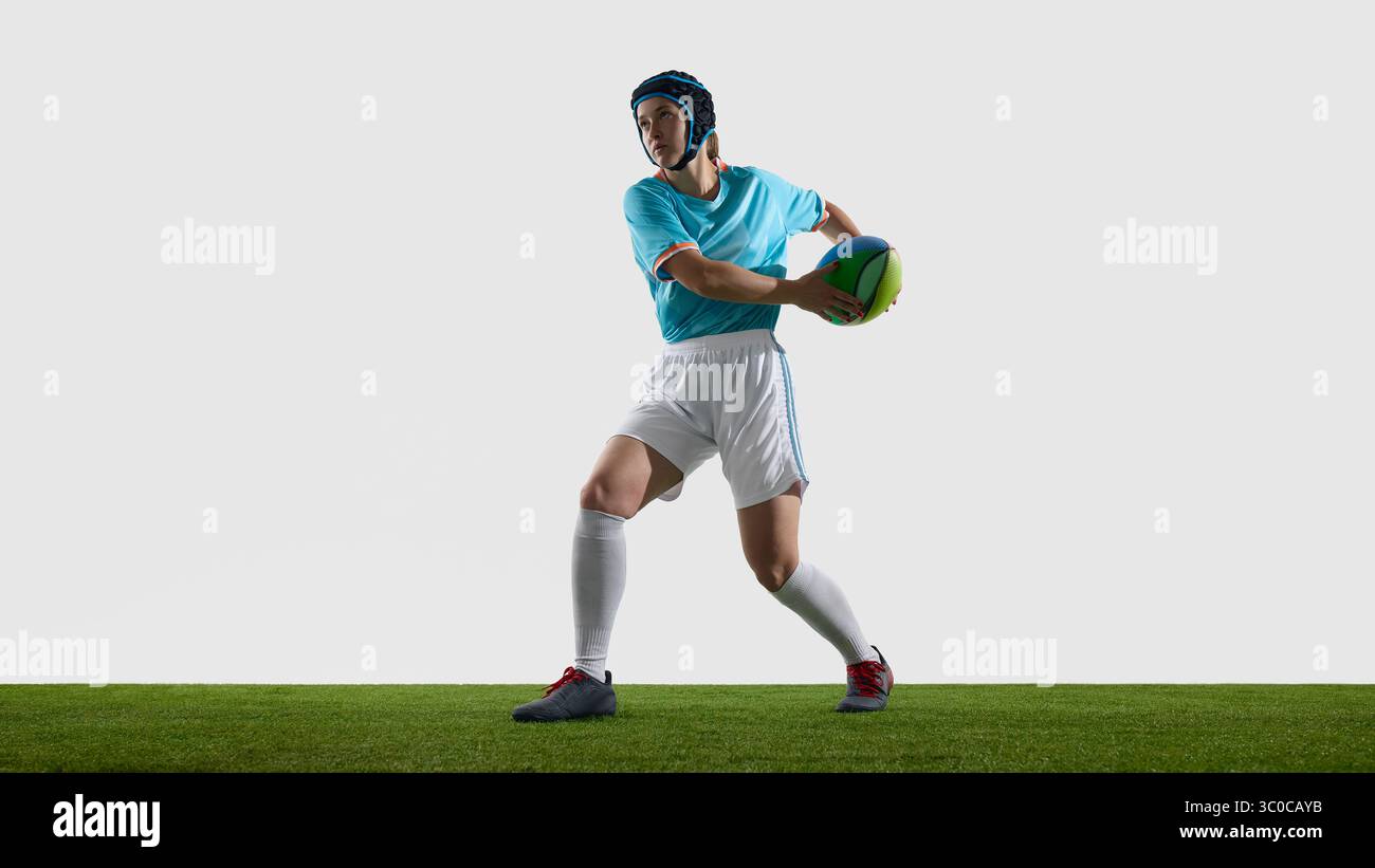 Woman rugby athlete active on field wearing sports attire and safety ...