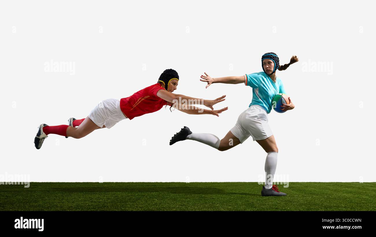 Two female rugby players in action on a green field against white ...