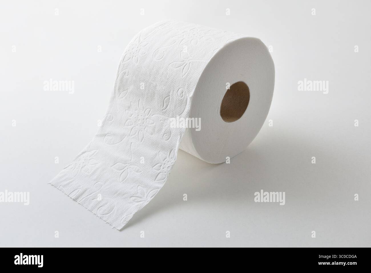 One soft wc paper roll with texture on white base and white isolated ...