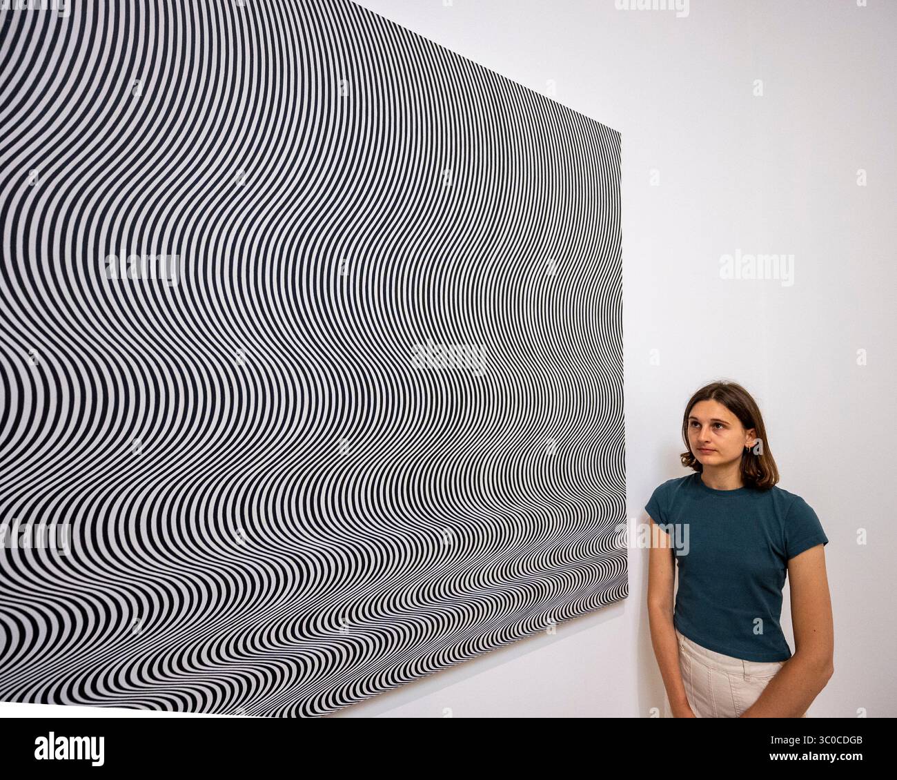 London, UK. 21 July 2025. A staff member with the newly restored ‘Fall ...
