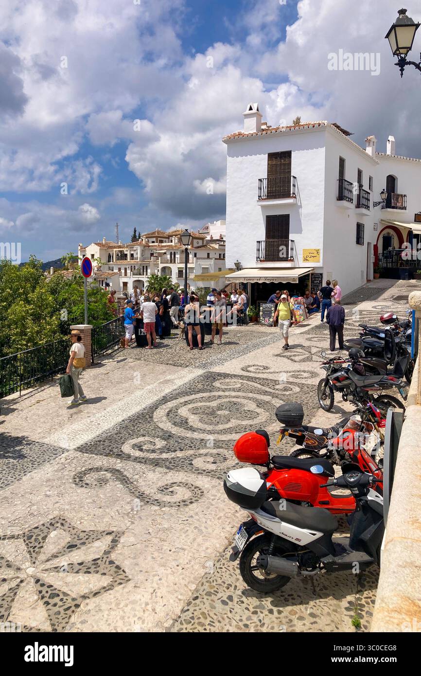 FRIGILIANA, SPAIN - MAY 10, 2025: A peaceful walk through the charming ...