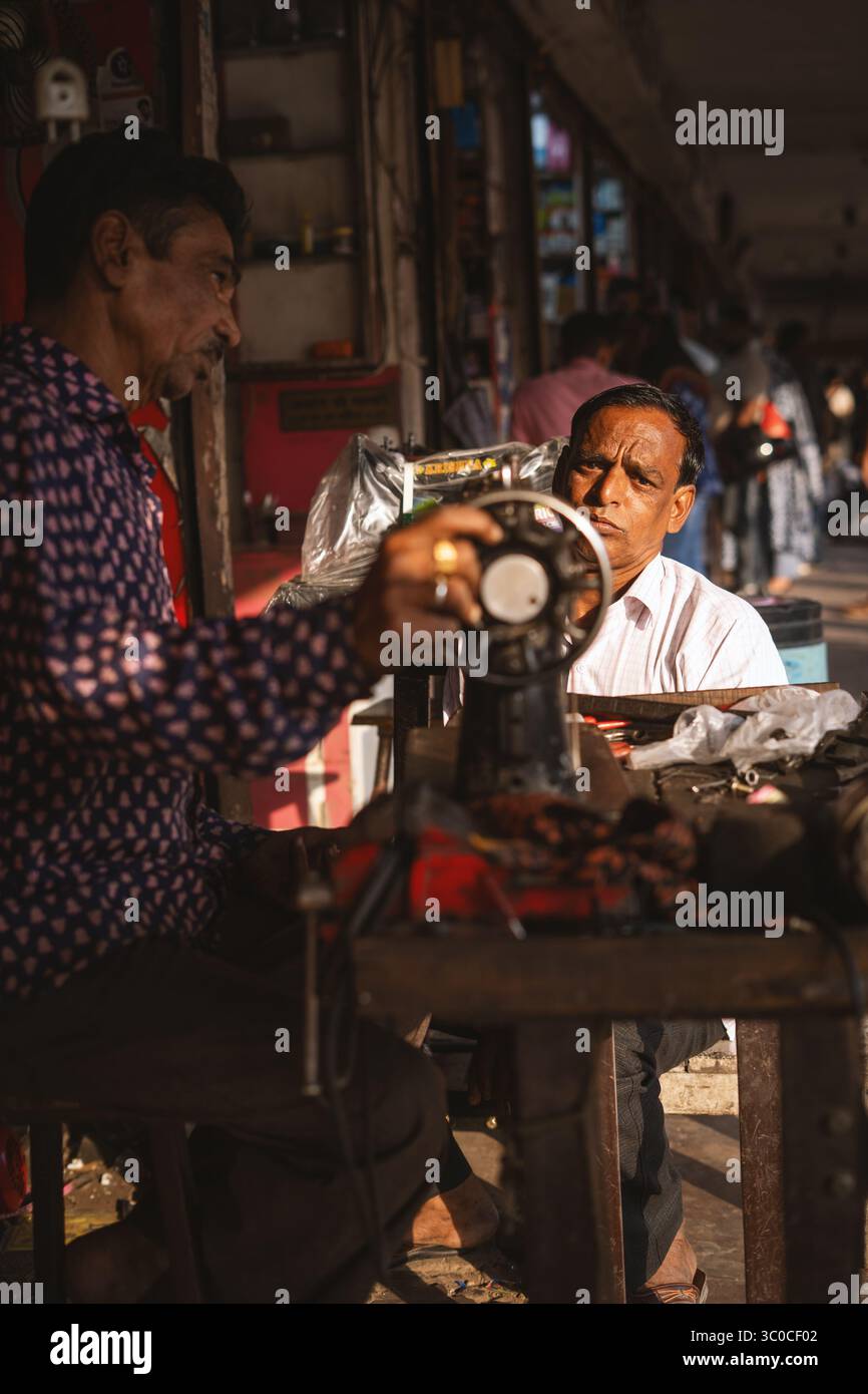 Rajasthan, Jaipur, India - A street tailor at work, stitching stories ...