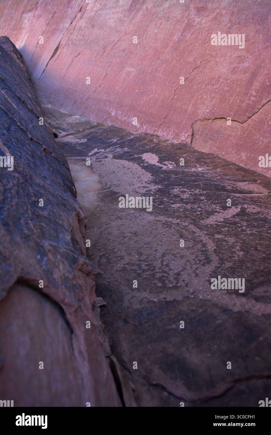 Petroglyphs carved just below the Courthouse Wash Pictograph Panel ...