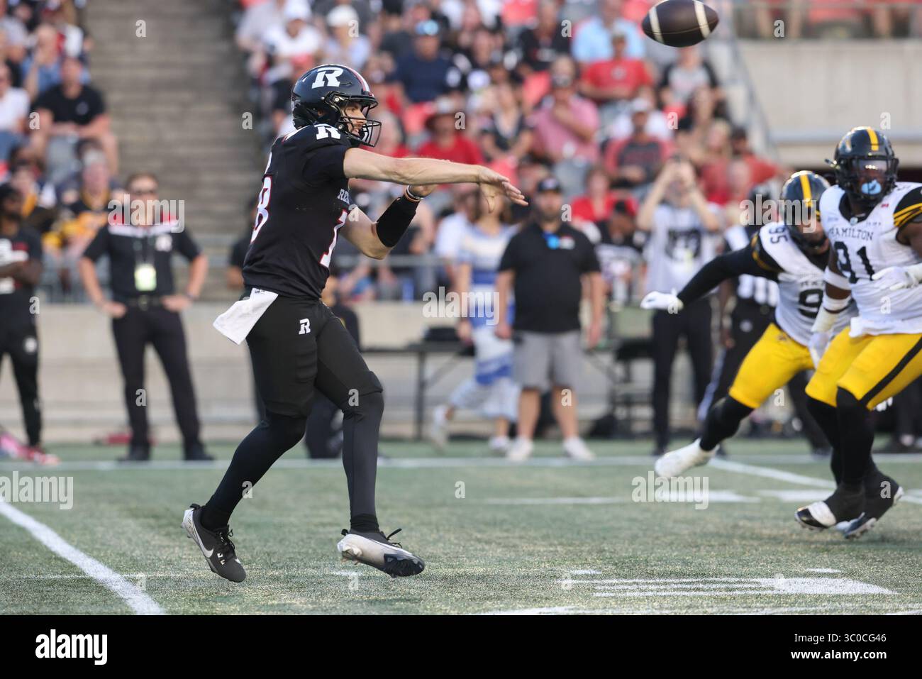 July 20, 2025: Ottawa RedBlacks quarterback Dustin Crum (18) throws the ...