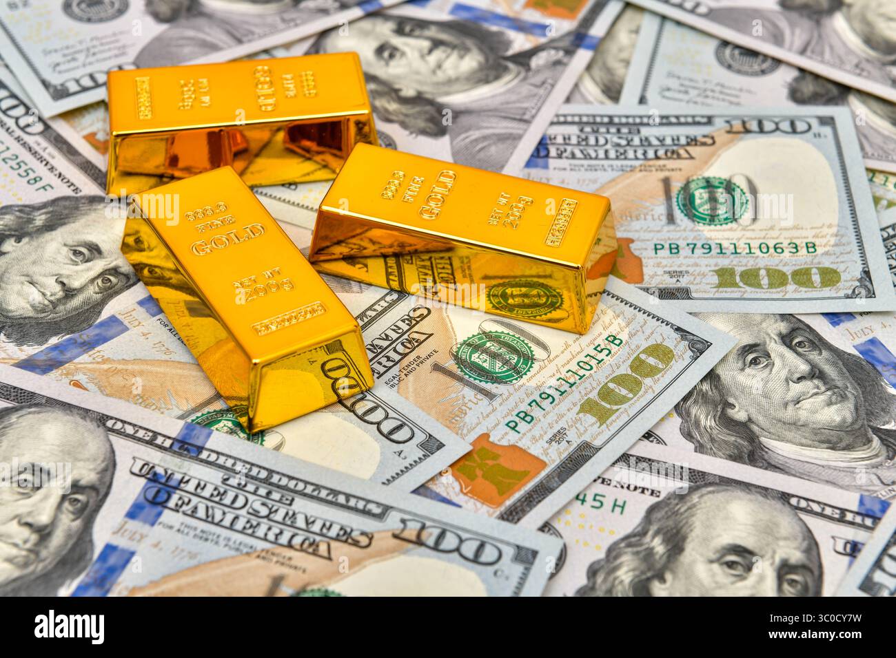 Paper us 100 dollar bill with gold bars, concept of investment and ...