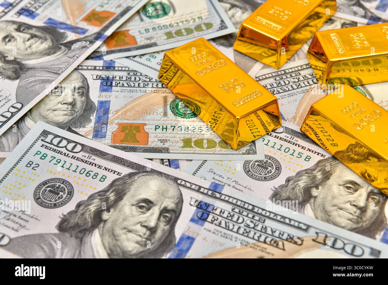 Paper us 100 dollar bill with gold bars, concept of investment and ...