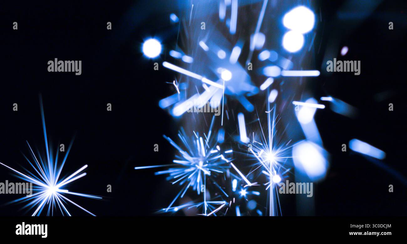 Fireworks: close-up blue sparkler, horizontal format Stock Photo - Alamy