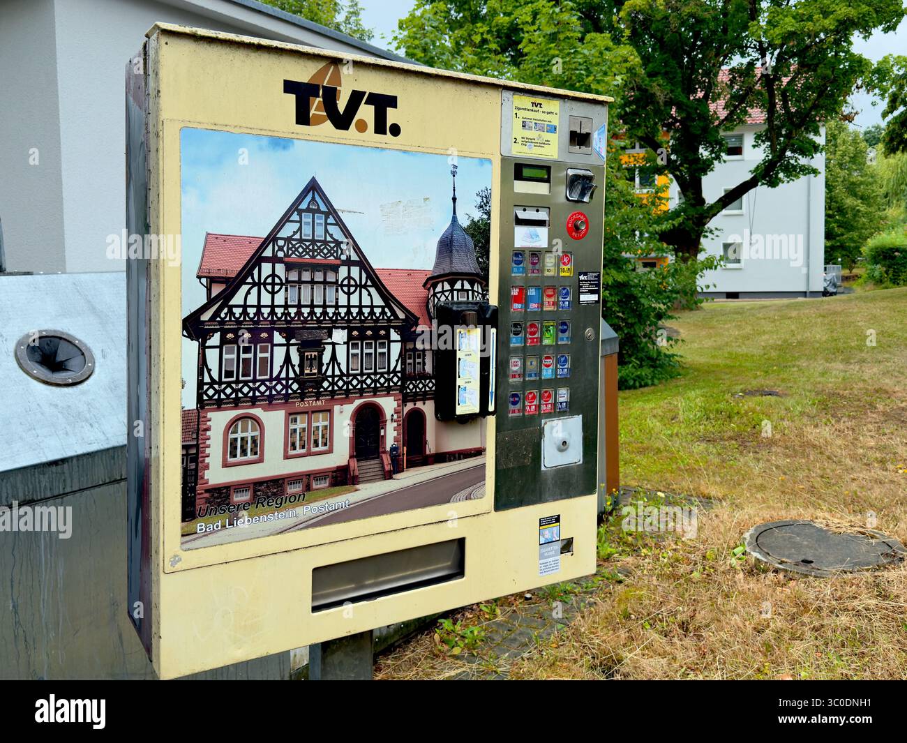 Free-standing German cigarette vending machine in a public urban area ...
