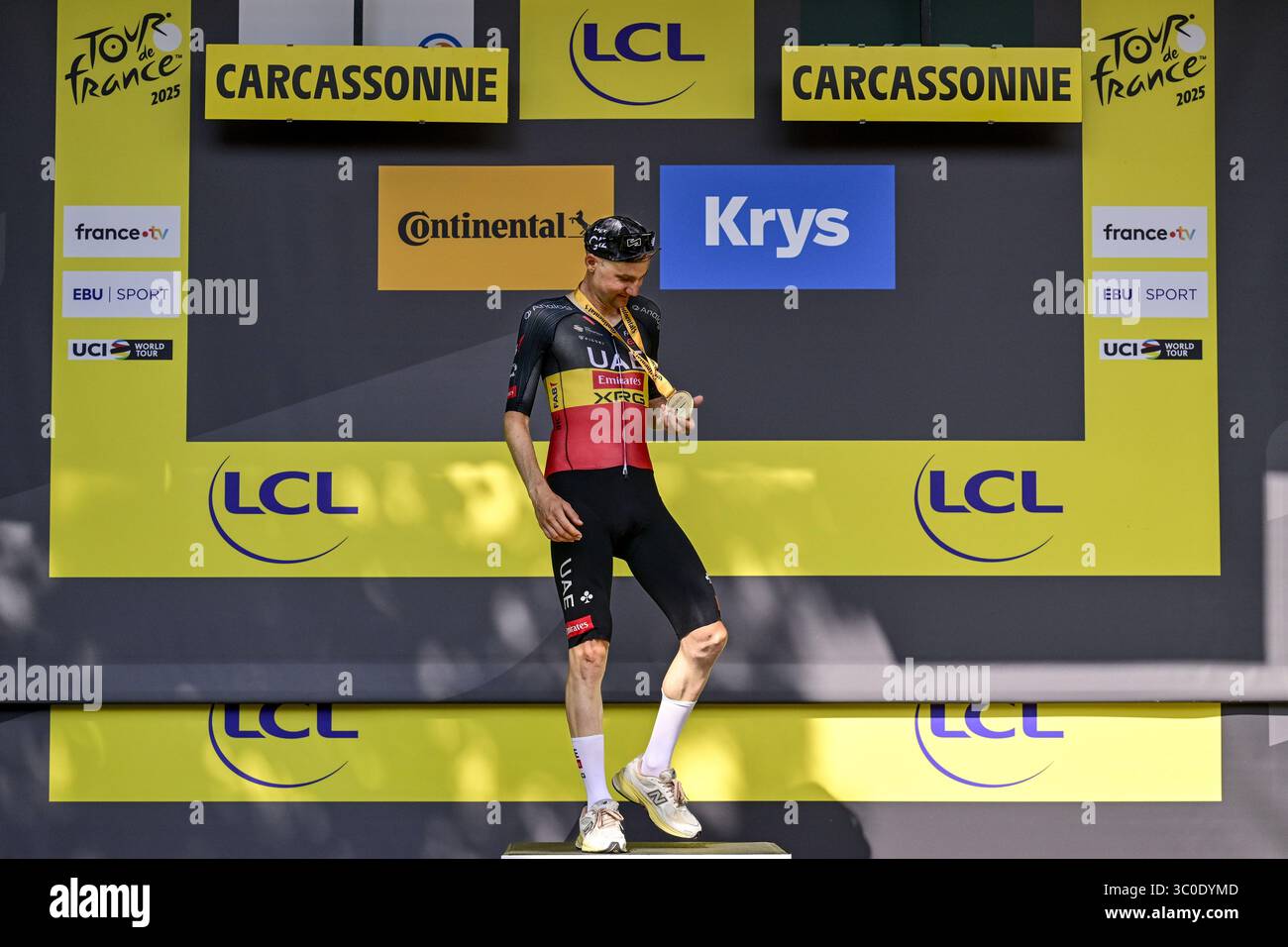 Belgian Tim Wellens of UAE Team Emirates celebrates on the podium after ...