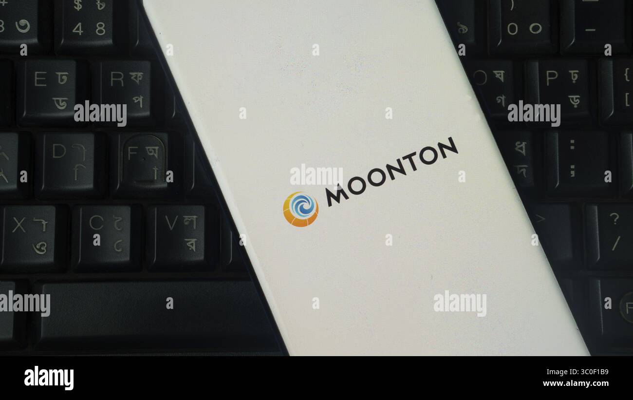 Moonton logo on a white device above a keyboard Stock Photo - Alamy