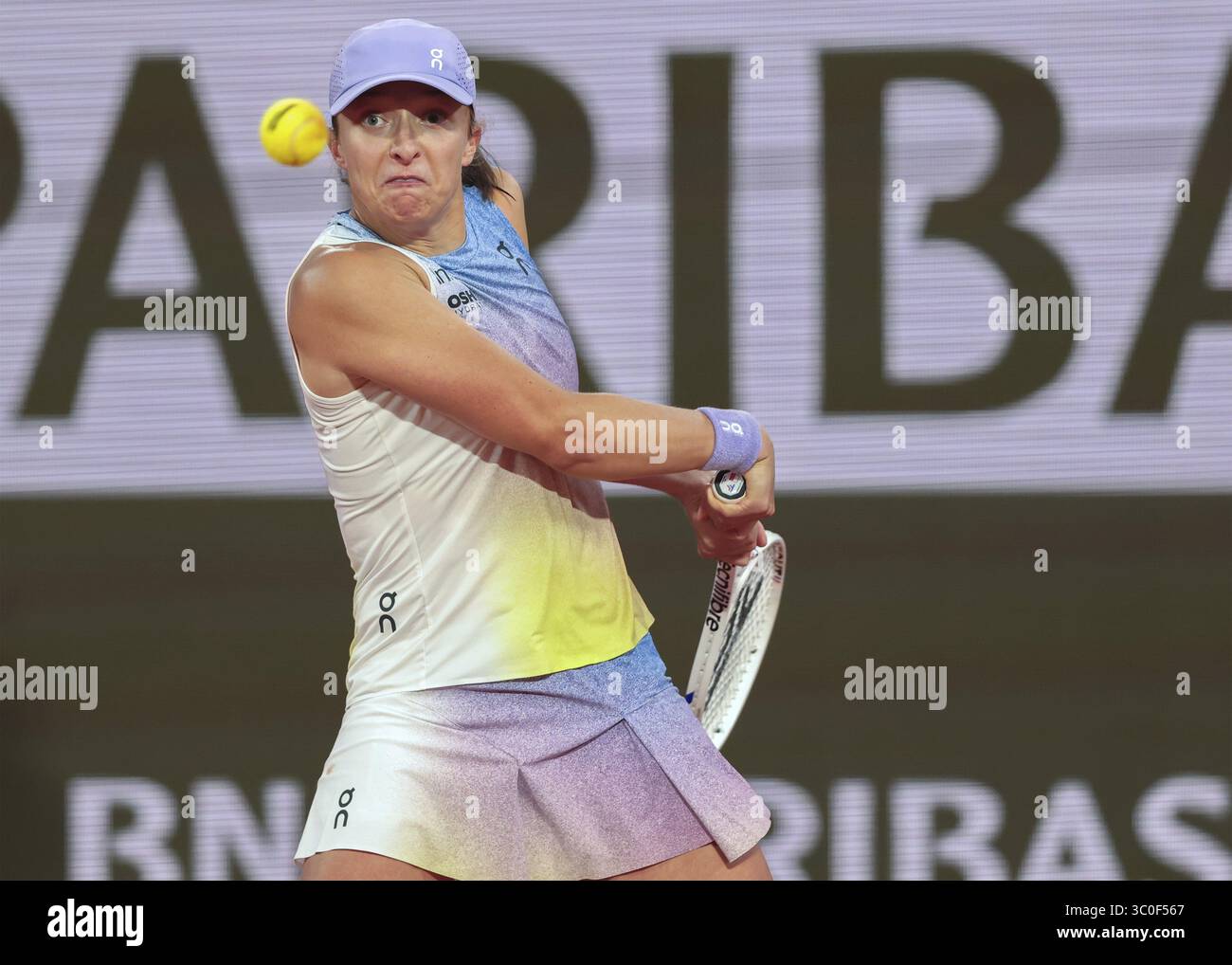 Polish tennis player Iga Swiatek in action at the French Open 2025 ...