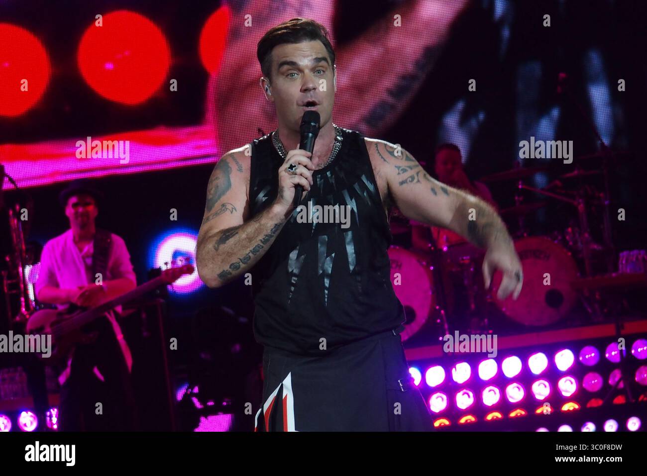 British singer Robbie Williams performs at Bentegodi Stadium during his ...