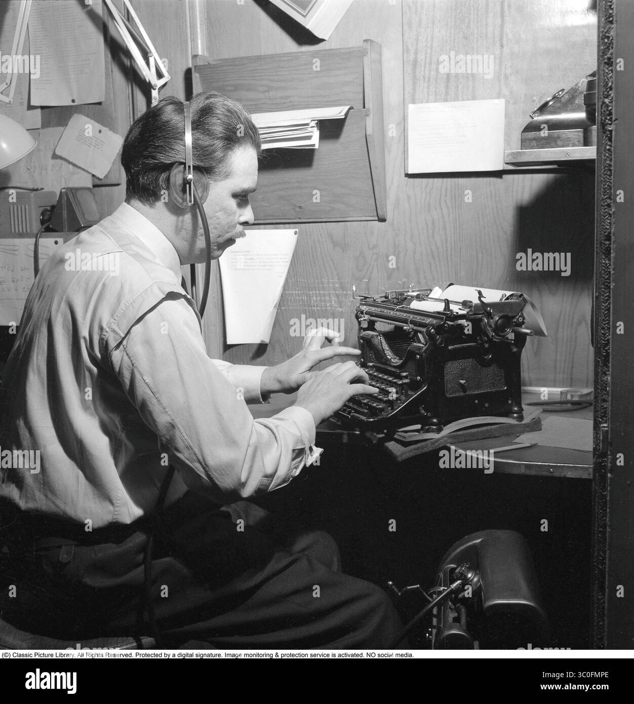 Typewriter 1956 man in hi-res stock photography and images - Alamy