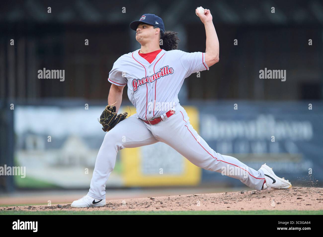 Greenville Drive pitcher Erik Rivera (51) delivers a pitch during a game against the Asheville ...